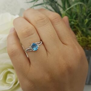 Dazzlingrock Collection 7X5 MM Oval Blue Topaz & Round Diamond Ladies Engagement Ring in 925 Sterling Silver, Size 8