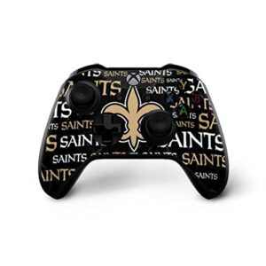 skinit decal gaming skin compatible with xbox one x controller - officially licensed nfl new orleans saints black blast design