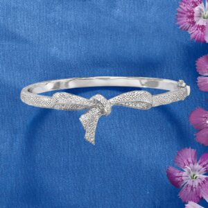 Ross-Simons 0.15 ct. t.w. Diamond Bow Bangle Bracelet in Sterling Silver. 8 inches