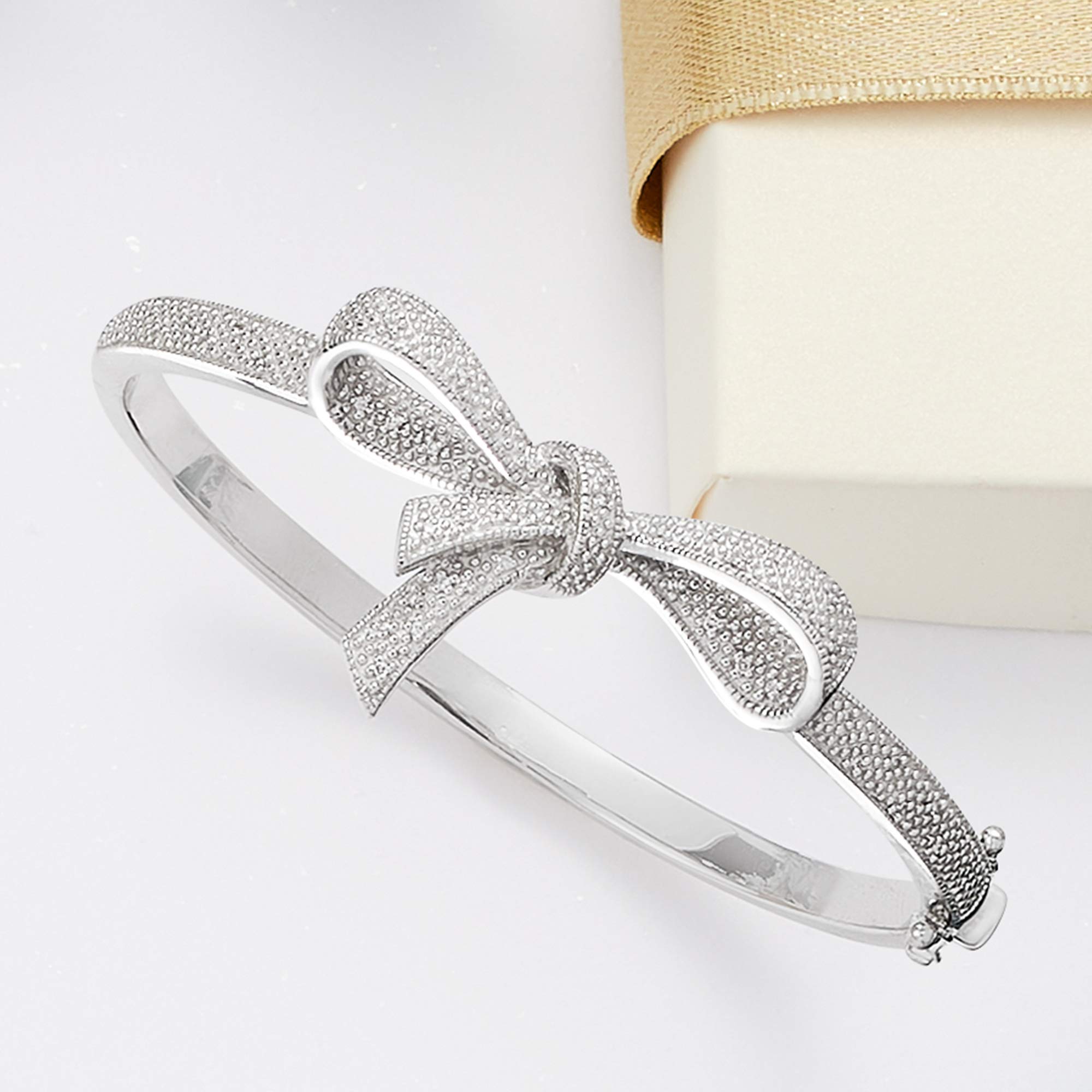 Ross-Simons 0.15 ct. t.w. Diamond Bow Bangle Bracelet in Sterling Silver. 8 inches