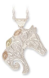 landstroms sterling silver horse pendant with black hills 12k gold leaves