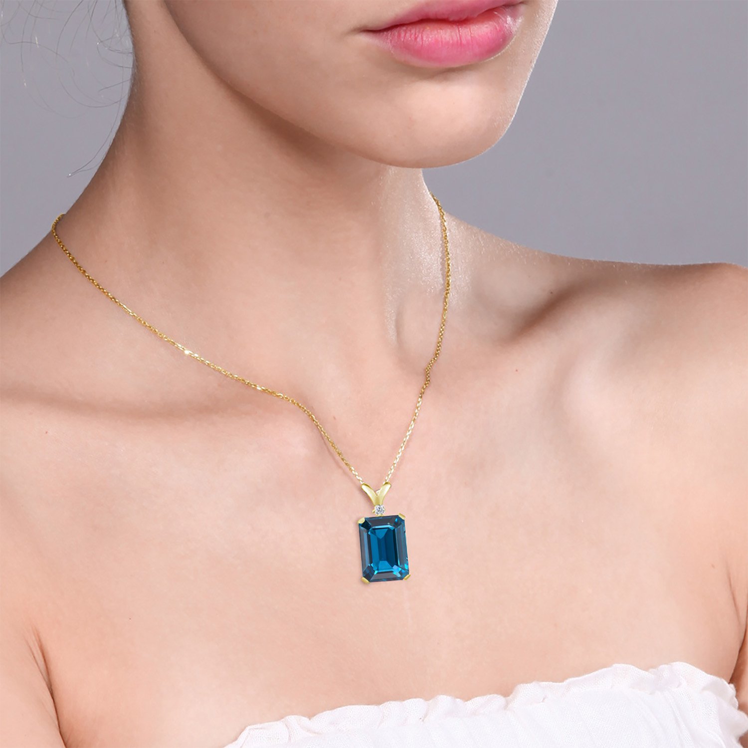 Gem Stone King 18K Yellow Gold Plated Silver London Blue Topaz and White Diamond Pendant Necklace For Women (9.52 Cttw, Gemstone Birthstone, with 18 Inch Chain)