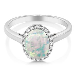 Gem Stone King 10K White Gold White Simulated Opal and Diamond Engagement Ring For Women (0.60 Cttw, Oval Cabochon 9X7MM) (Size 7)