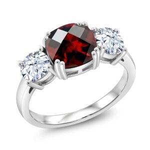 gem stone king 925 sterling silver red garnet and white zirconia 3 stone engagement ring for women (3.90 cttw, gemstone january birthstone, cushion checkerboard 8mm, size 8)