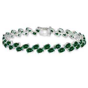 b. brilliant sterling silver simulated emerald 5x3mm oval wave tennis bracelet