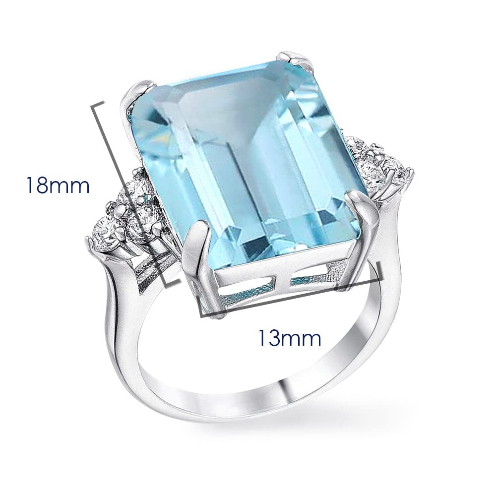 Samie Collection Princess Diana 20ctw Emerald Cut Simulated Gemstone in Aquamarine-tone, Emerald-tone, Garnet-tone Cocktail Ring for Women Inspired by Royal Wedding in White Gold Plating, Size 5-10