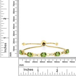 Gem Stone King 18K Yellow Gold Plated Silver Green Peridot and White Lab Grown Diamond Tennis Bracelet For Women (4.52 Cttw, Gemstone August Birthstone, Oval 7x5MM, Fully Adjustable Up to 9 Inch)