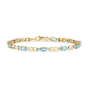 10k yellow gold oval blue topaz and diamond accent infinity link bracelet