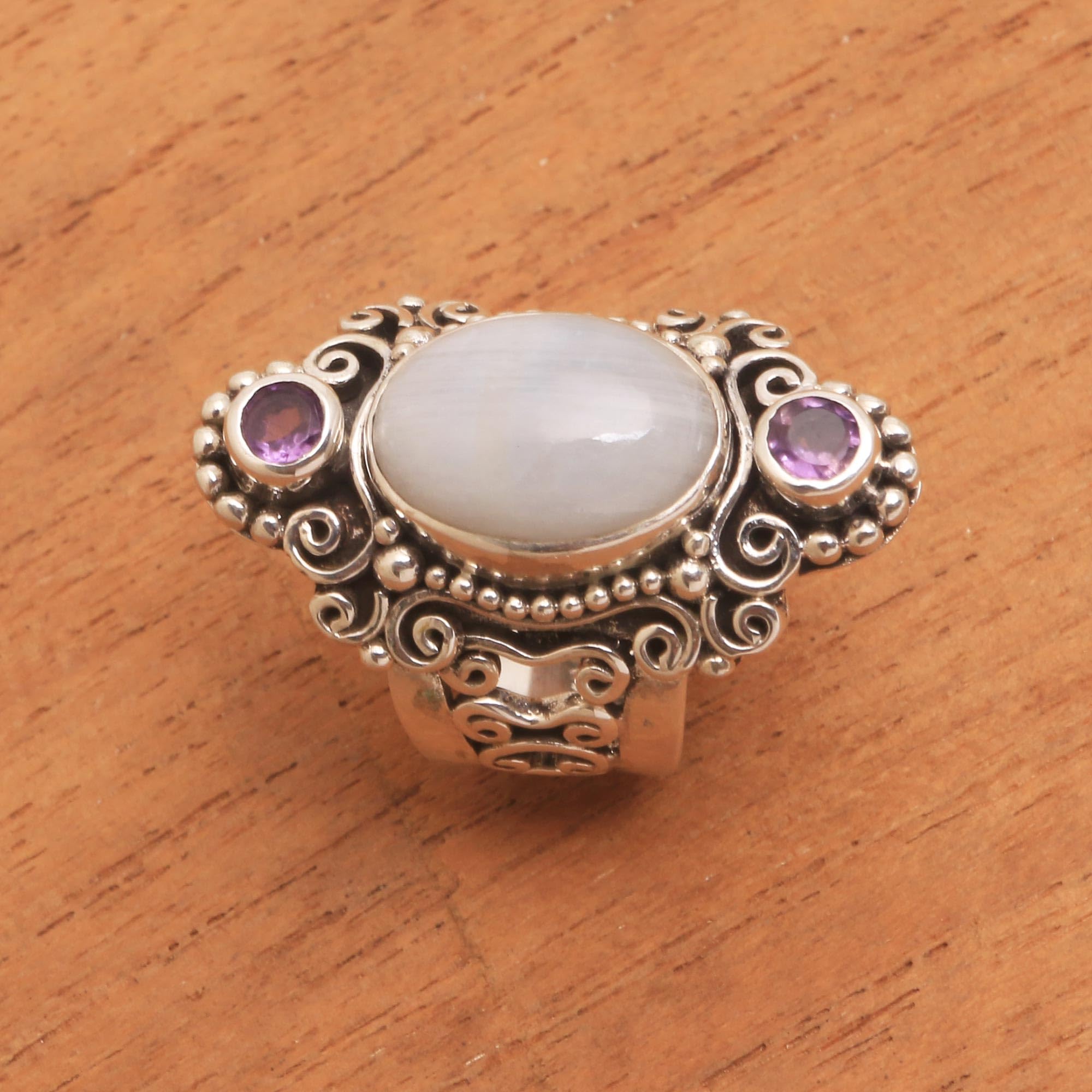 NOVICA Artisan Handmade Rainbow Moonstone Amethyst Cocktail Ring from Bali Sterling Silver Indonesia Gemstone Birthstone [ring Front 1.2 in L x 0.6 in W x 0.3 in H Band Width 8 mm W] ' Glimpse of