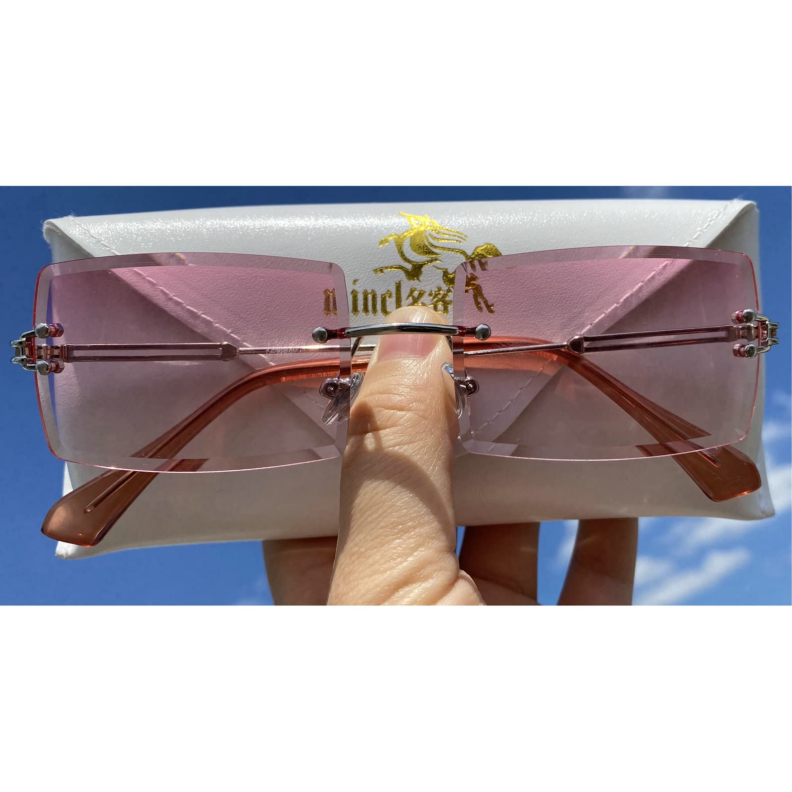 mincl/Fashion Small Rectangle Sunglasses Women Ultralight Candy Color Rimless Ocean Sun Glasses (silver&pink)