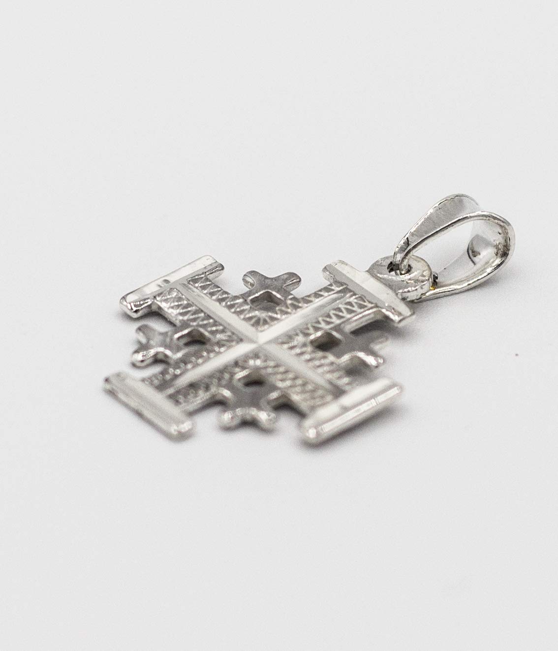 Sterling Silver (925) Jerusalem Crusader's cross Pendant Handcrafted in the Holy Land. Engraved by diamond cutting machine.