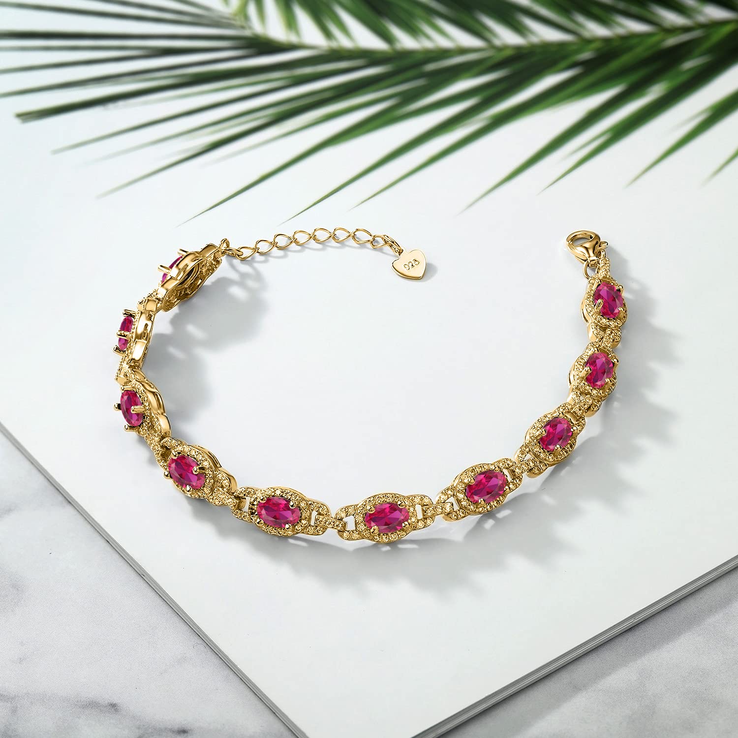 Gem Stone King 18K Yellow Gold Plated Silver Oval Red Created Ruby Tennis Bracelet For Women (14.60 Cttw, 7 inch with 1 inch Extender)