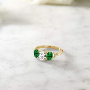 Gem Stone King 10K Yellow Gold Oval White Created Sapphire Green Simulated Emerald and Diamond 3-Stone Engagement Ring For Women (1.72 Cttw, Available In Size 5, 6, 7, 8, 9)