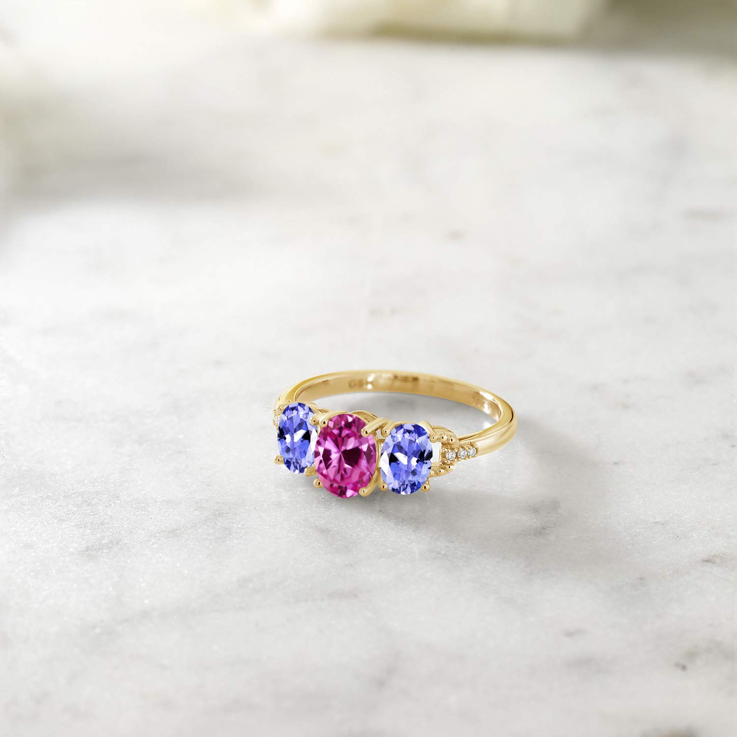 Gem Stone King 10K Yellow Gold Oval Pink Created Sapphire Blue Tanzanite and Diamond Engagement Ring For Women (1.82 Cttw, Available In Size 5, 6, 7, 8, 9)