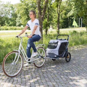 TRIXIE 2-in-1 Dog Bike Trailer and Pet Stroller for Medium Dogs up to 66 lbs, Quick Set-up and Fold Down, Gray