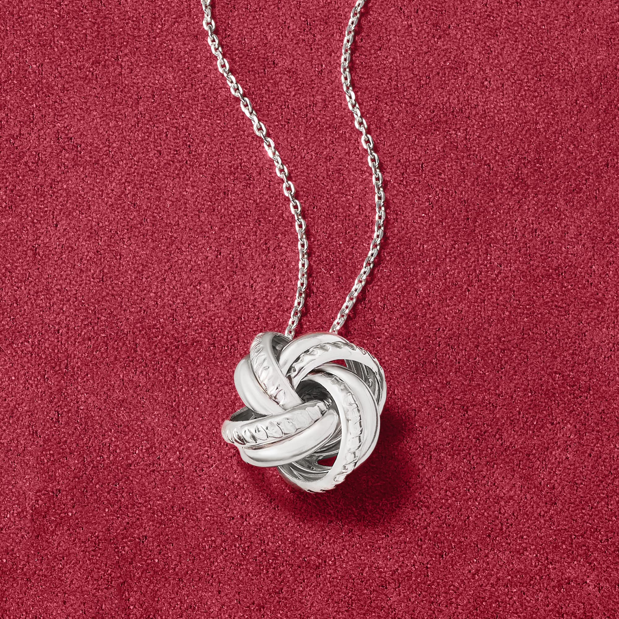 Ross-Simons Italian Sterling Silver Love Knot Pendant Necklace. 18 inches