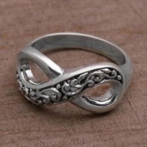 NOVICA Artisan Handmade Sterling Silver Band Ring Crafted Infinity Symbol from Bali No Stone Indonesia [ring Front 0.4 in H x 0.8 in W x 0.1 in D Band Width 3 mm W] ' Tangled Vine'