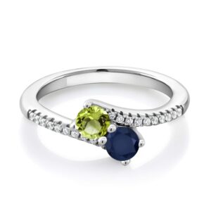 gem stone king 925 sterling silver green peridot and blue sapphire bypass ring for women (0.89 cttw, gemstone august birthstone, round 4mm, available in size 5, 6, 7, 8, 9)