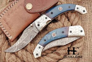 huntex custom handmade hand-forged twist pattern damascus steel 4 inch long natural tinted camel bone handle razor sharp hunting camping folding pocket trailing knife with genuine leather pouch