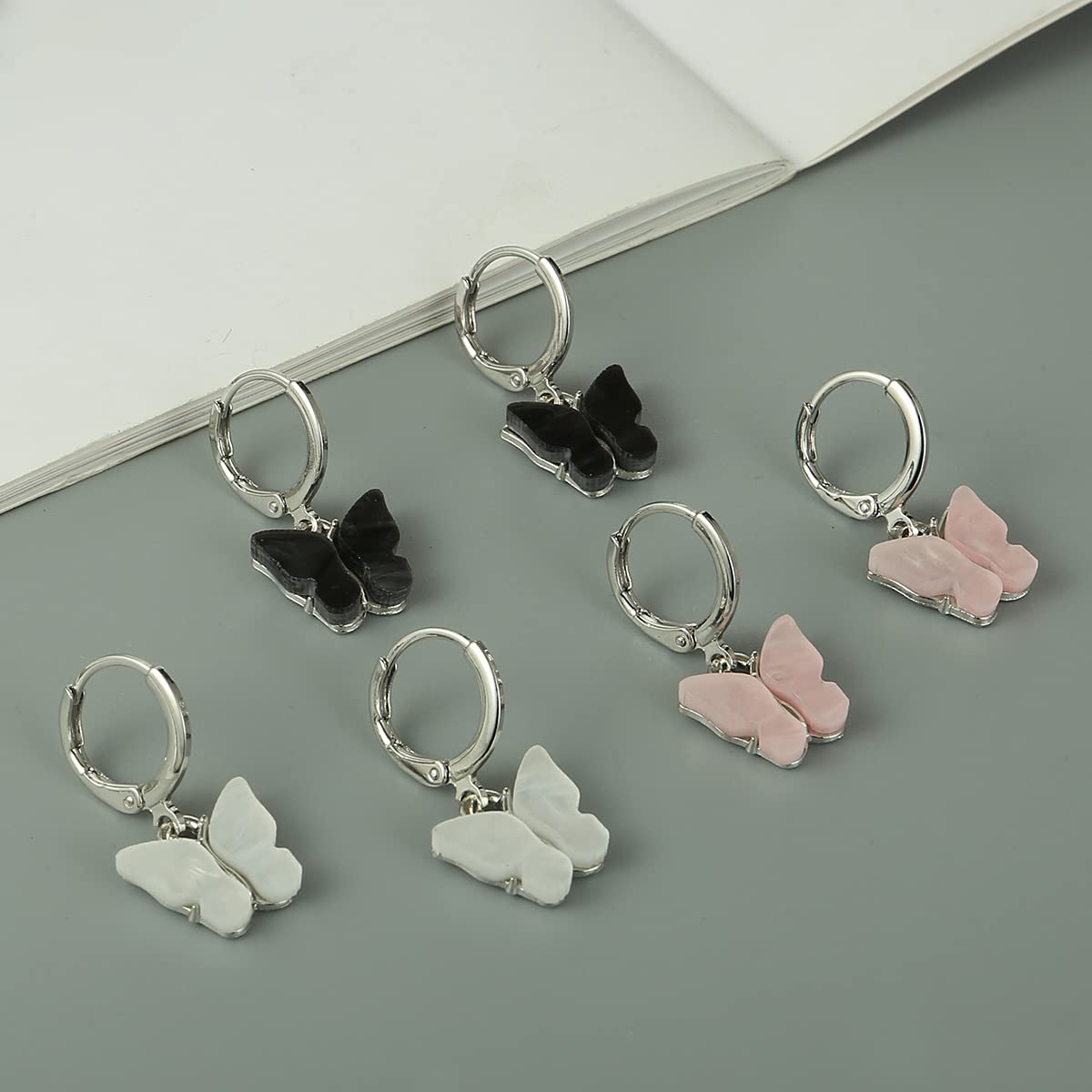 AIDSOTOU 12 Pairs Small Silver Butterfly Star Hoop Earrings Sets for Women Girls Mini Huggie Hoop Earrings with Dangle Charms