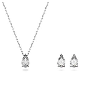 swarovski stilla attract jewelry set, pendant necklace and stud earrings with sparkling clear drop-shaped crystals on a rhodium finish setting, part of the stilla attract collection