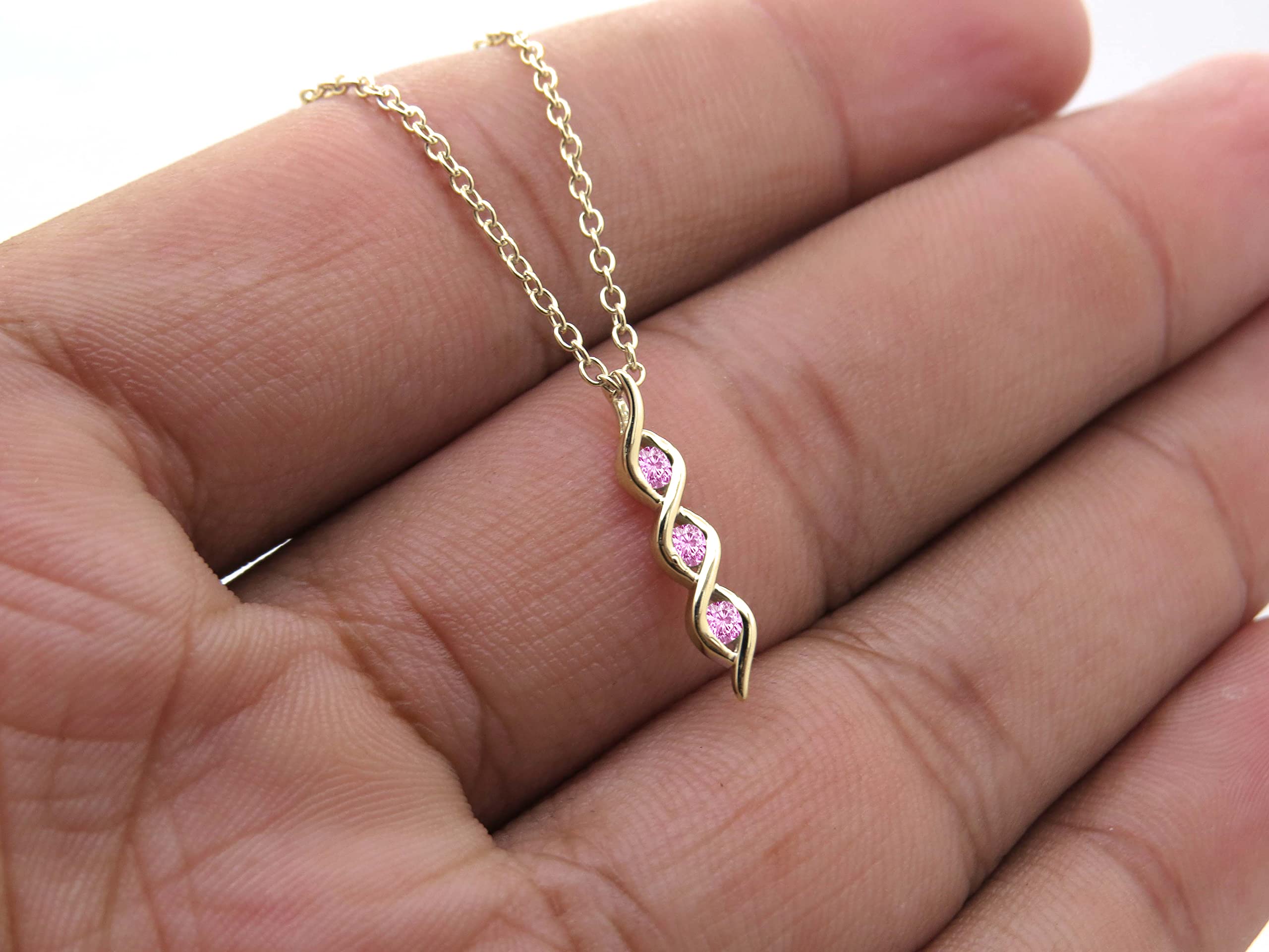 Dazzlingrock Collection Round Pink Sapphire Ladies Twist 3 Stone Infinity Pendant (Color Pink, Clarity Highly Included), 10K Yellow Gold