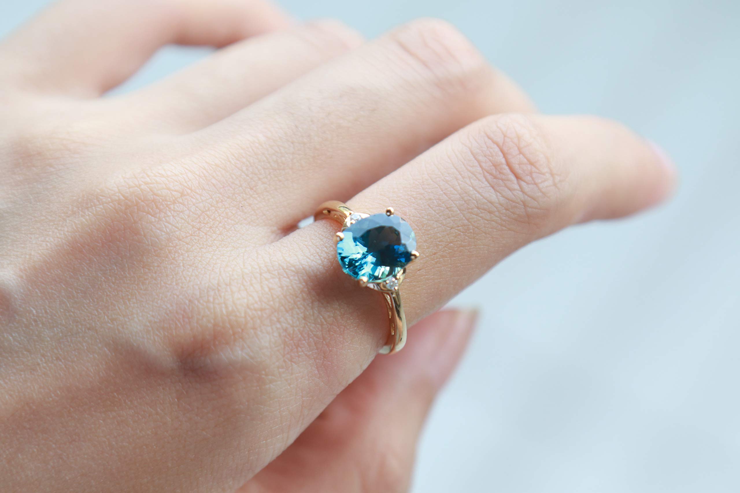 Gin & Grace 10K Yellow Gold Genuine London Blue Topaz Ring with Diamonds for women | Ethically, authentically & organically sourced (Oval-cut) shaped London Blue Topaz hand-crafted jewelry for her…