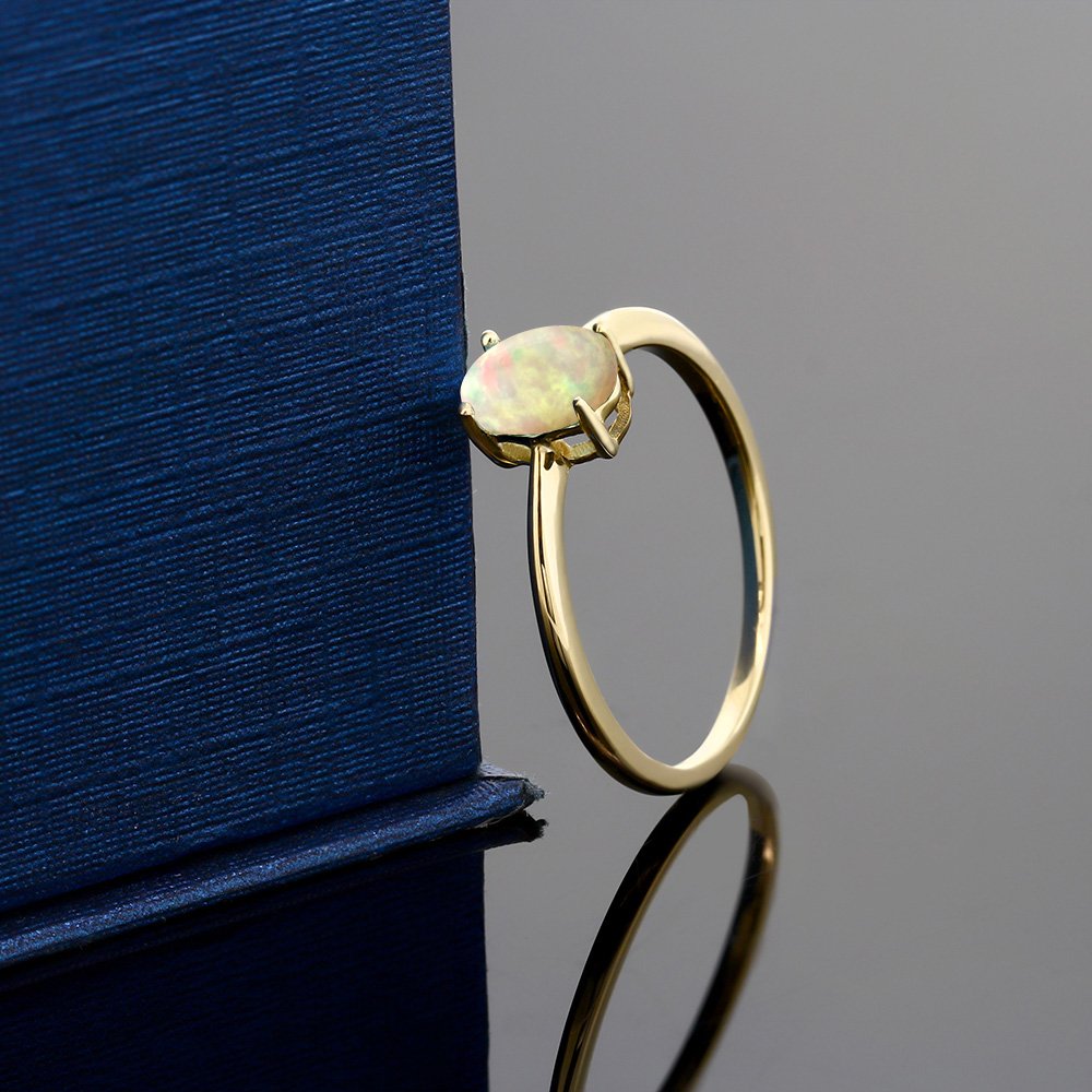 Gem Stone King 10K Yellow Gold White Ethiopian Opal Solitaire Engagement Ring For Women | 0.51 Cttw | Oval Cabochon 7X5MM | Gemstone October Birthstone | Available In Size 5-10