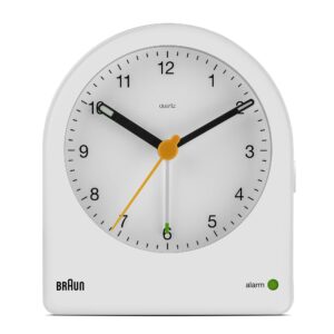 braun classic analogue alarm clock with snooze and continuous backlight, quiet quartz movement, crescendo beep alarm in white, model bc22w.