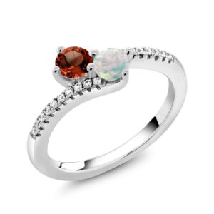 Gem Stone King 925 Sterling Silver Red Garnet and White Opal Bypass Ring For Women (0.86 Cttw, Gemstone January Birthstone, Round 4MM, Available In Size 5, 6, 7, 8, 9)