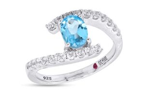 gemvio collection bypass design, 5x7mm oval blue topaz gemstone and cubic zirconia promise ring in 14k white gold over sterling silver sterling silver engagement wedding ring for womens size-6