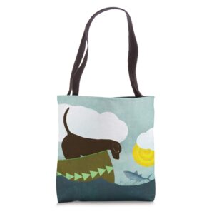 chocolate lab on the lake in a canoe meets a fish tote bag