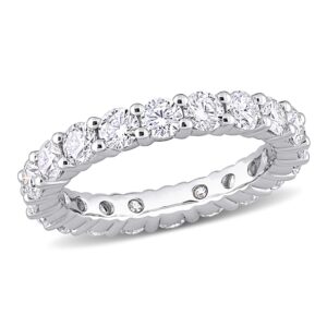 abbie+cleo round shape created white moissanite gemstone eternity band ring in rhodium flash plated sterling silver, size 6