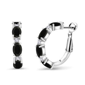 gem stone king 925 sterling silver black onyx and white created sapphire hoop earrings for women (3.44 cttw, gemstone birthstone, oval 6x4mm)