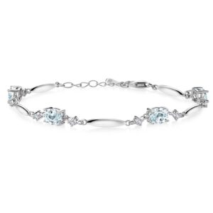 Gem Stone King 925 Sterling Silver Sky Blue Aquamarine and White Created Sapphire Tennis Bracelet For Women | 3.32 Cttw | Gemstone March Birthstone | Oval 7X5MM | 6 Inch + 1 Inch Extender