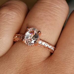 XIALV Rose Gold Plated Cubic Zirconia 2 Carats Oval Cut Ring Simulated Diamond CZ Wedding Engagement Ring for Women (US size 10)