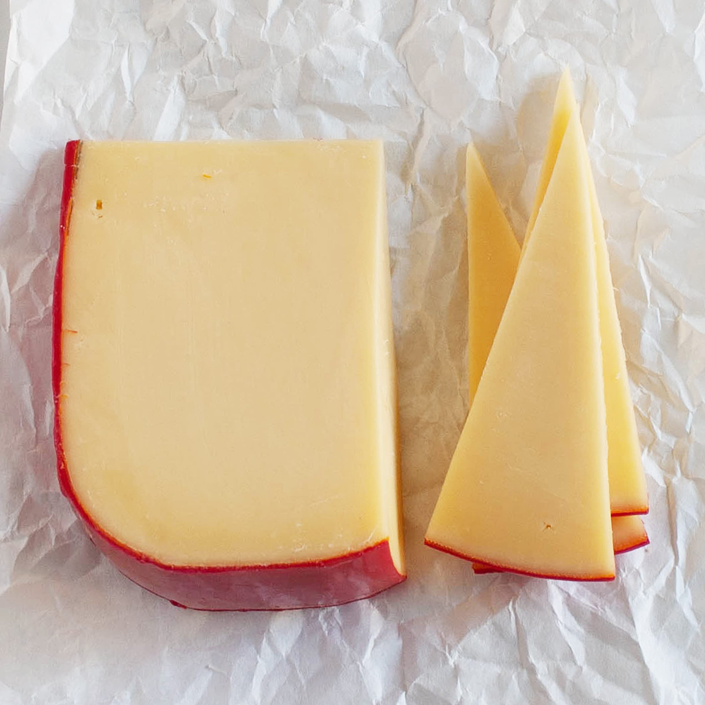 Dutch Gouda Cheese From Holland -And igourmet Cheese Storage Bag - Whole Wheel (10 pound) - Hits the midpoint of creaminess in the spectrum of cheeses