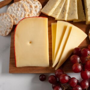 Dutch Gouda Cheese From Holland -And igourmet Cheese Storage Bag - Whole Wheel (10 pound) - Hits the midpoint of creaminess in the spectrum of cheeses