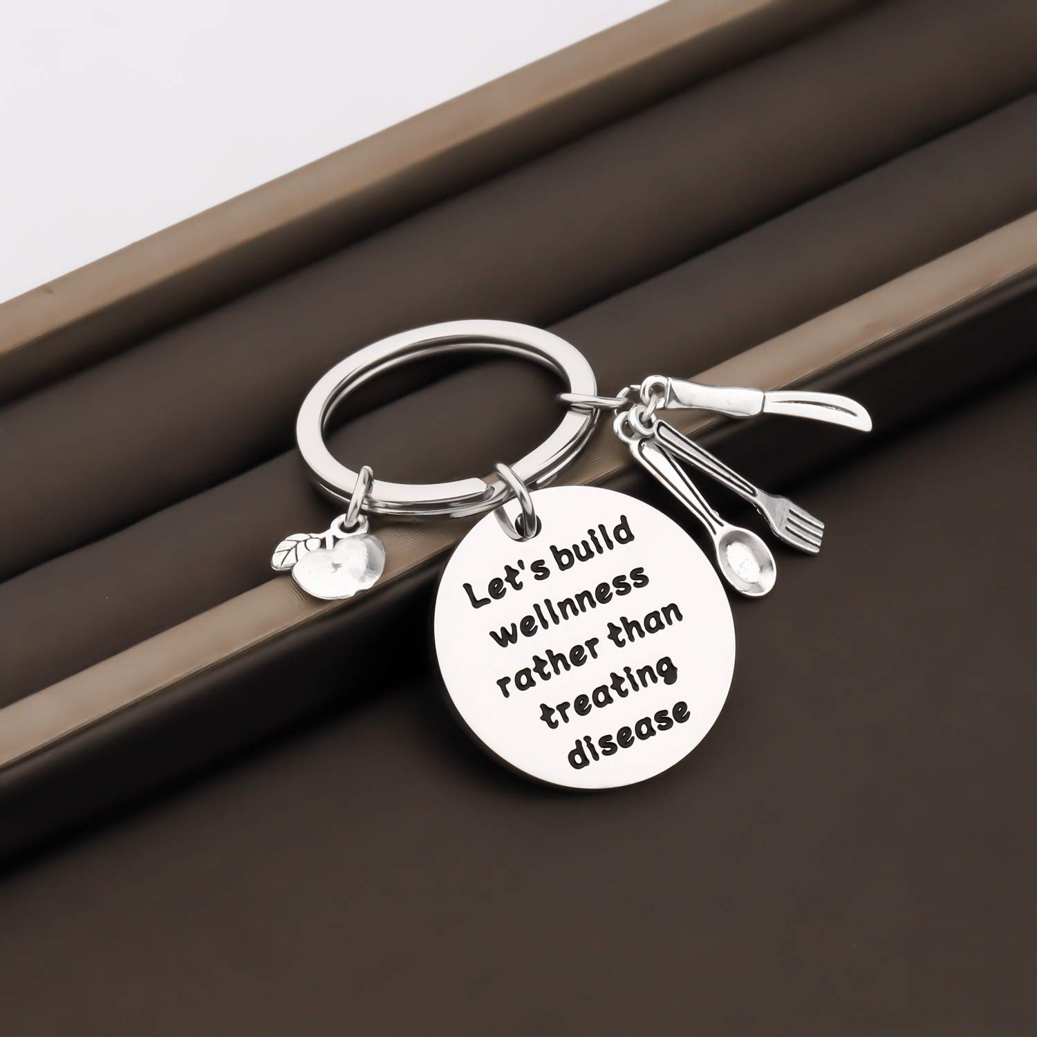 TGBJE Nutritionist Gift Keychain - 'Let's Build Wellness' Stainless Steel Keychain, Perfect for Dietitians, Nutrition Graduates & RDNs - Silver, Unisex, 3.0x3.0cm - Includes Velvet Pouch