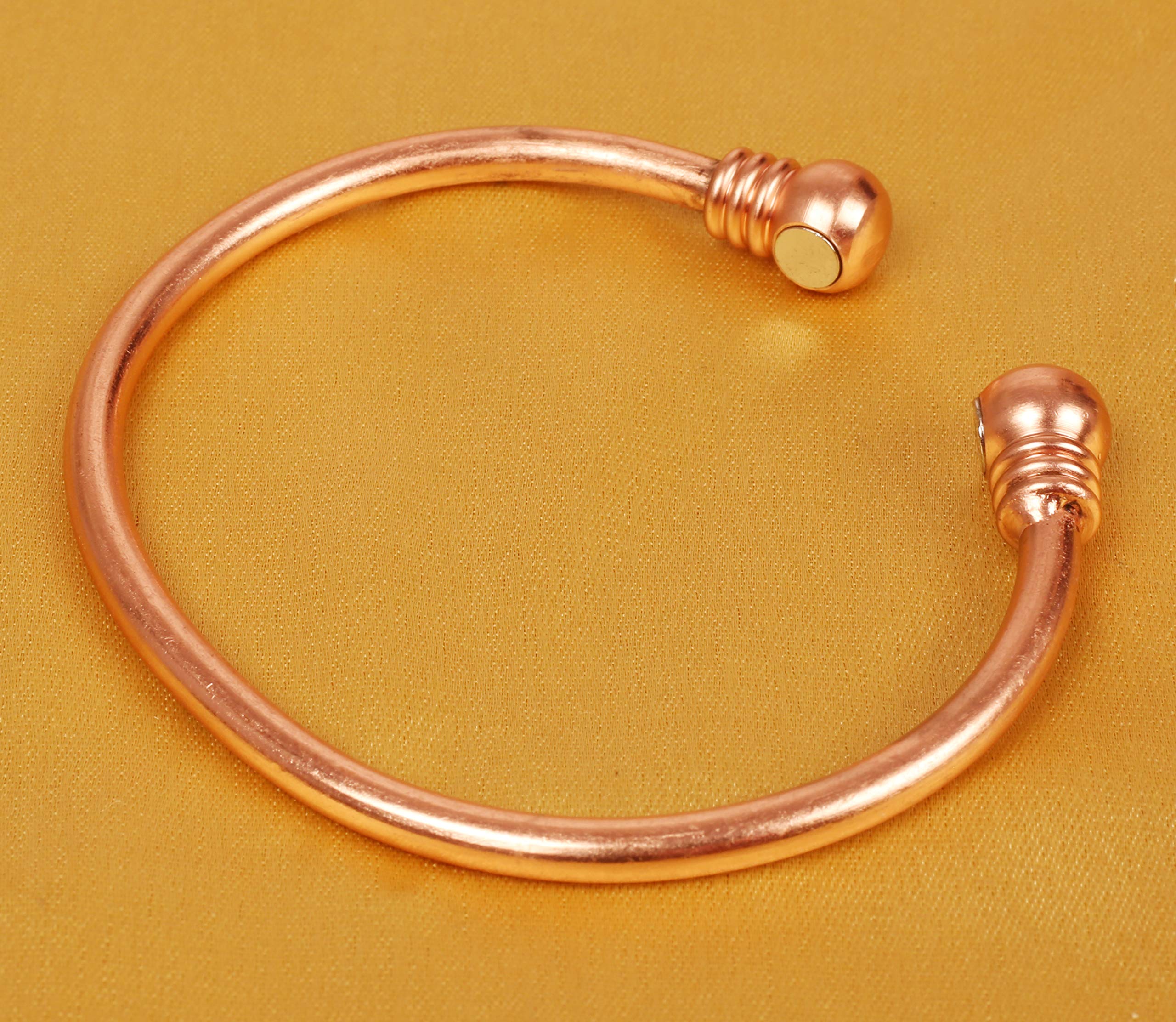 Touchstone Handcrafted By Indian Skilled Artisans Durable High Gauge Copper Hand Twisted Pipe Bracelet In Natural Tone.