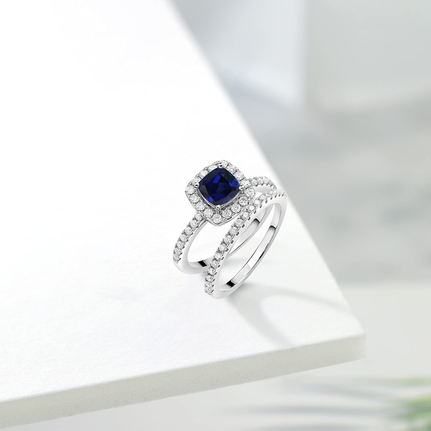 Gem Stone King 925 Sterling Silver Blue Created Sapphire and Moissanite Wedding Engagement Ring Band Bridal Set For Women (1.52 Cttw, Cushion 6MM, Available in size 5, 6, 7, 8, 9)