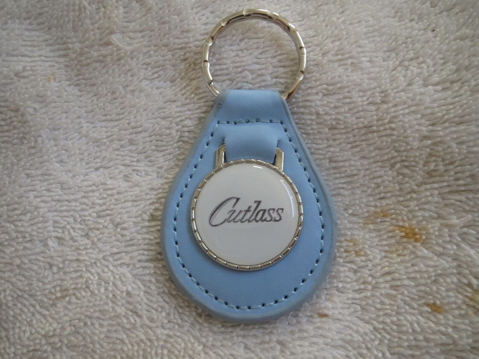 1960's 1970's ERA CUTLASS EMBLEM LOGO LEATHER KEYCHAIN - LIGHT BLUE