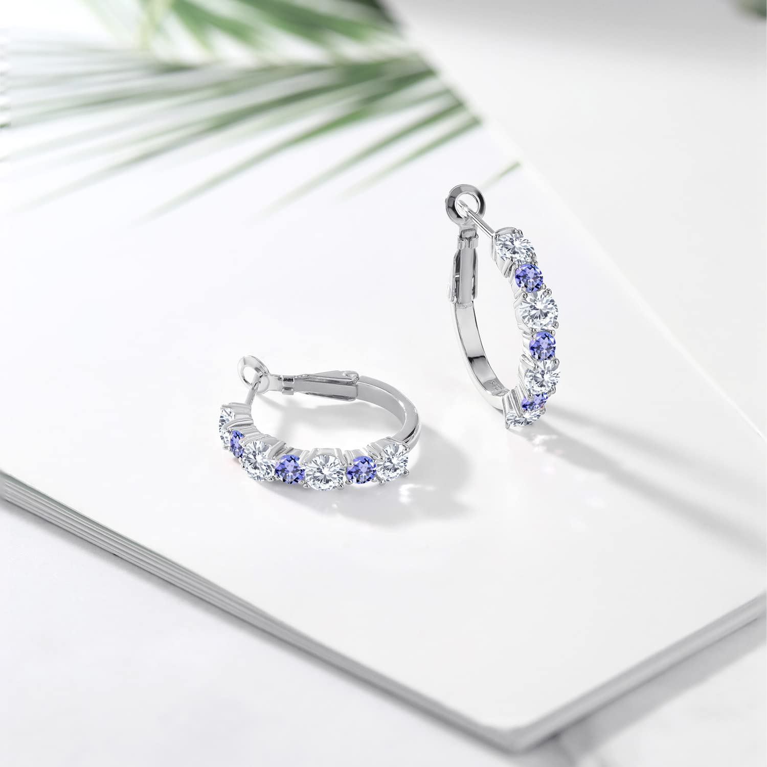 Gem Stone King 925 Sterling Silver White Moissanite and Blue Tanzanite Hoop Earrings For Women (2.74 Cttw, Gemstone Birthstone, Round 4MM and 3MM)