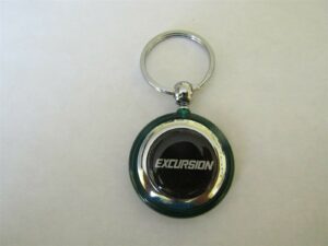 2000 2001 2002 2003 2004 2005 excursion logo round plastic keychain - green