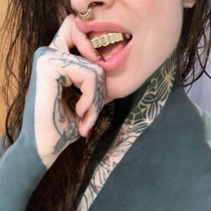 JINAO Hip Hop 4 Rows 8 Top Teeth 3 Rows 8 Bottom Tooth Grillz 14K Gold Plated Iced Out Cubic Zirconia Diamond Mouth Grills for Men and Women(Gold)