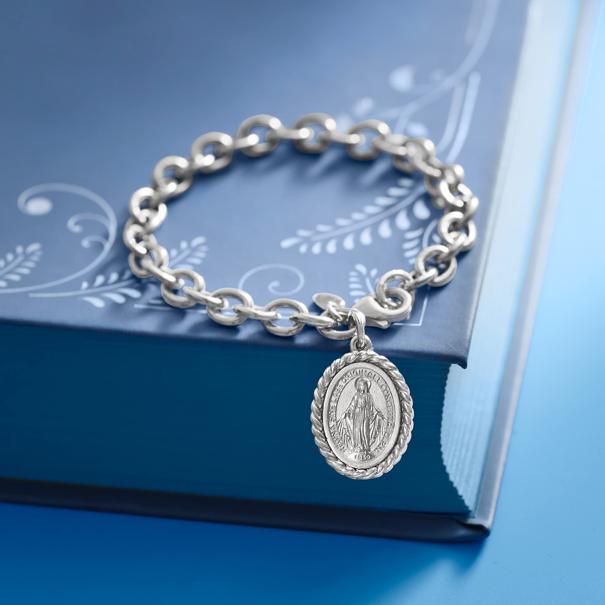 Ross-Simons Italian Sterling Silver Miraculous Medal Charm Bracelet. 7 inches