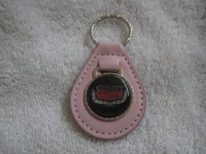 1962-1977 vintage comet logo leather keychain - pink