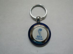 shelby american cs snake blue white logo round plastic keychain - blue