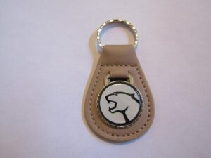 cougar cat emblem logo vintage style leather keychain - beige