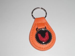 firebird or trans-am red bird logo leather keychain - pumpkin